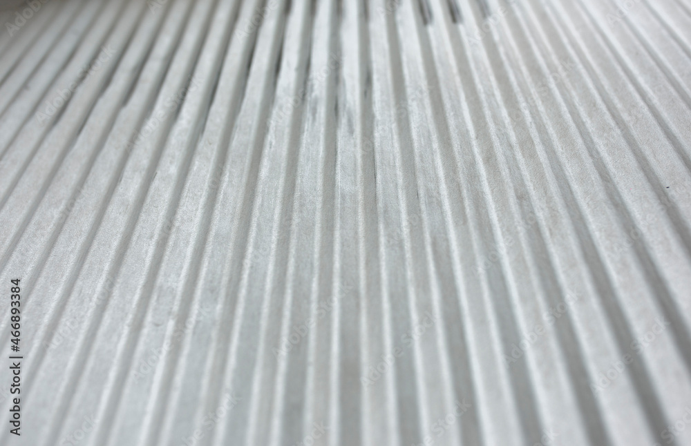 strong lighting and contrast on lines formed on a silver rustic metal ...