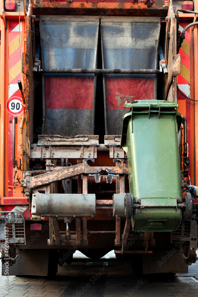 Process of garbage loading to the garbage truck Stock Photo | Adobe Stock