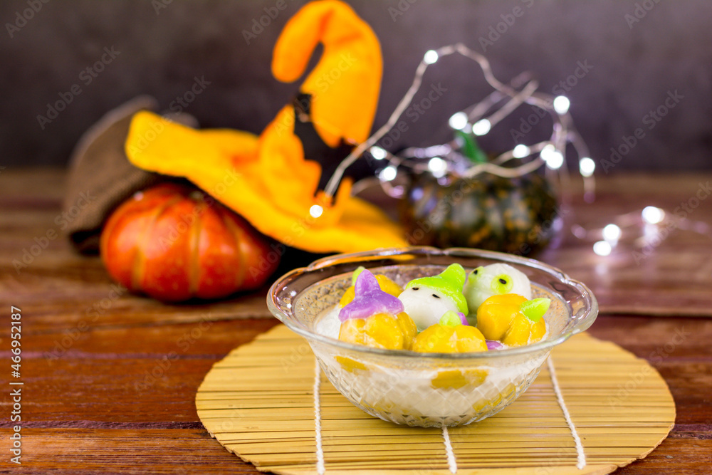 Halloween concept. Pumpkin and ghost (white and yellow) rice dumpling ...