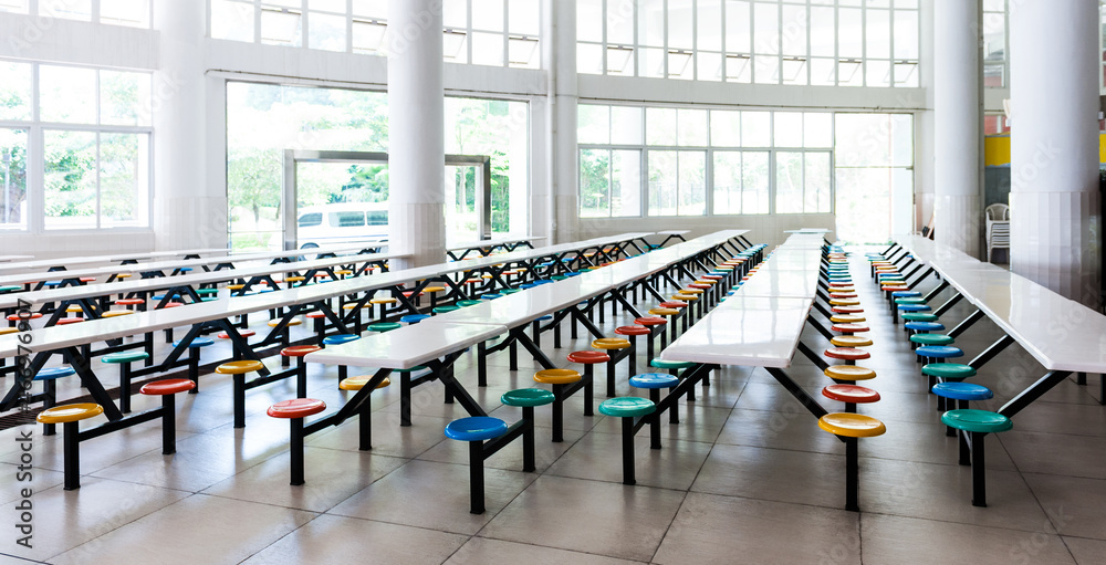 Modern school cafeteria with empty seats and tables Stock Photo | Adobe ...