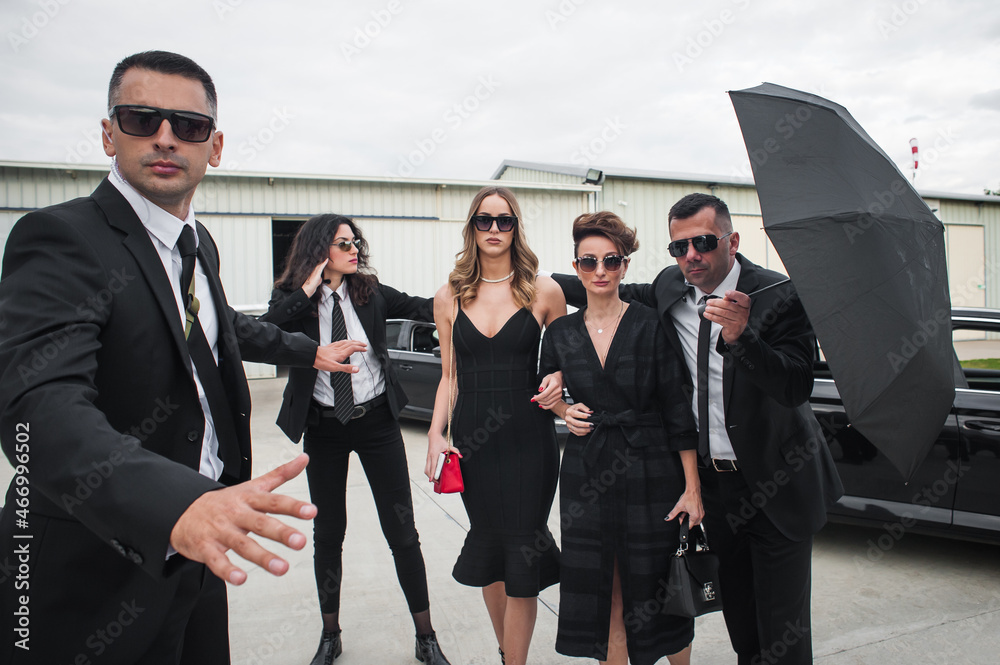 Female male security bodyguards team protect VIP celebrity public ...