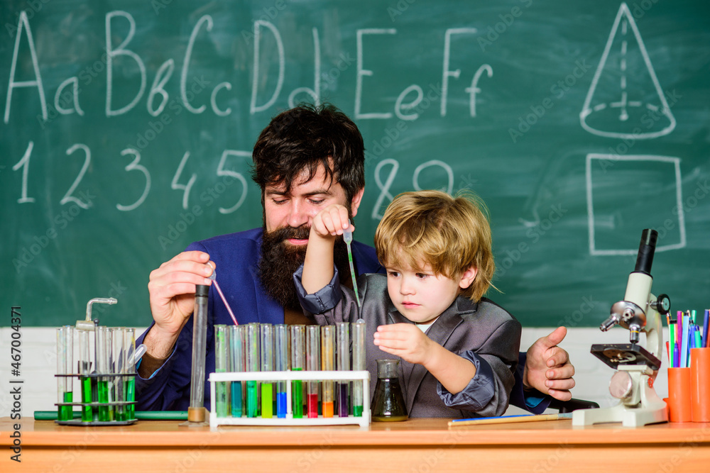 Know How. laboratory research and development. teacher man with little ...