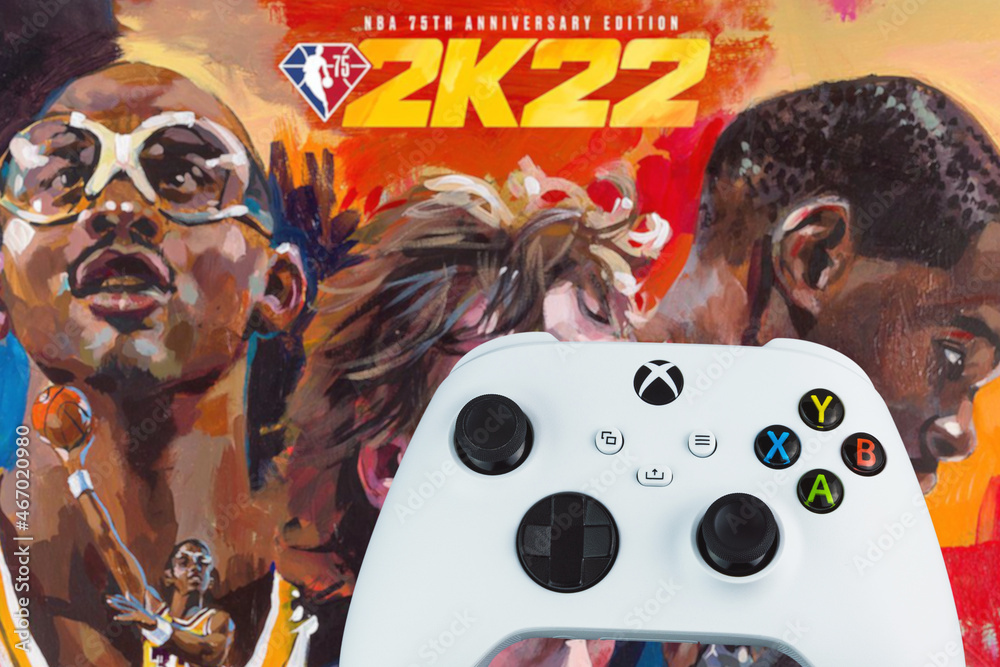 Xbox Series S Robot White Controller with Nba 2k22 game blurred in the ...