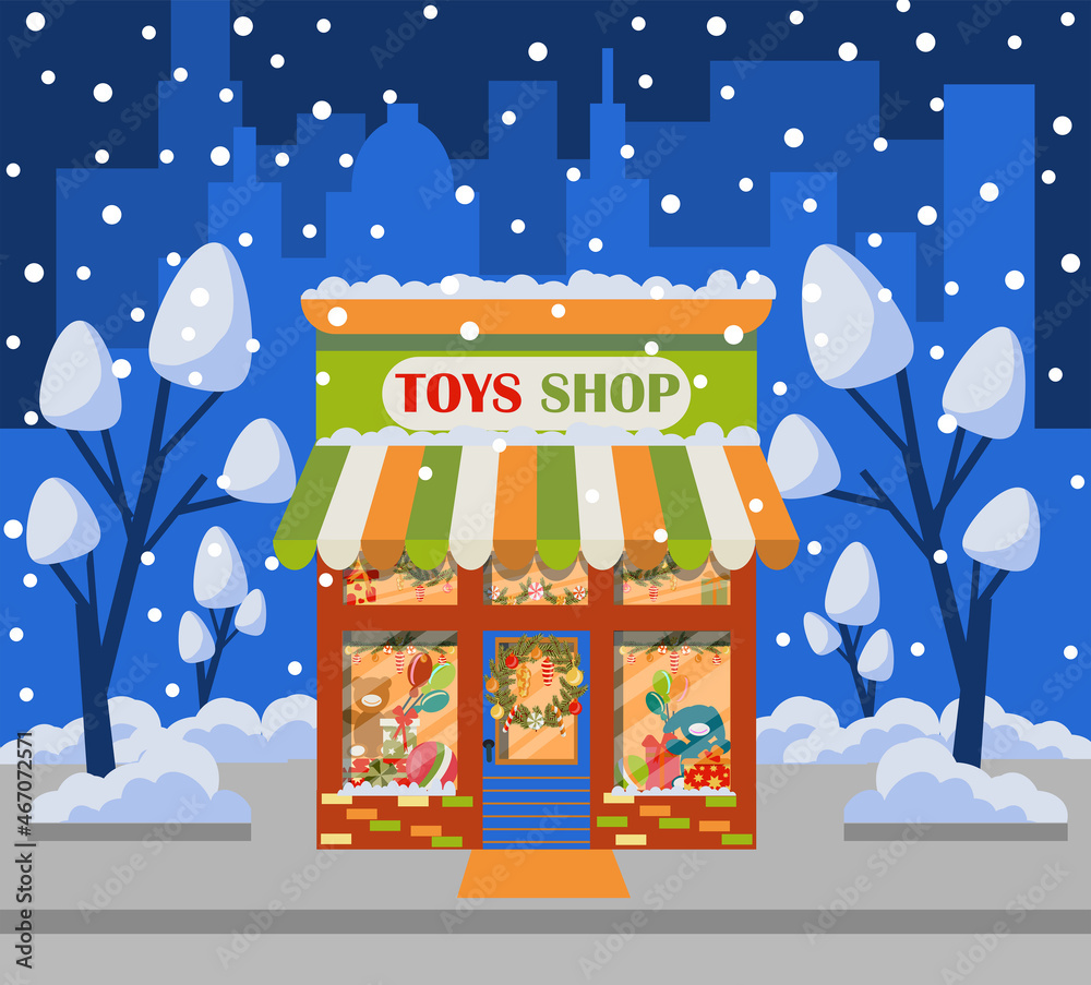 Christmas decorated and illuminated toy store. Cozy facade of a brick ...