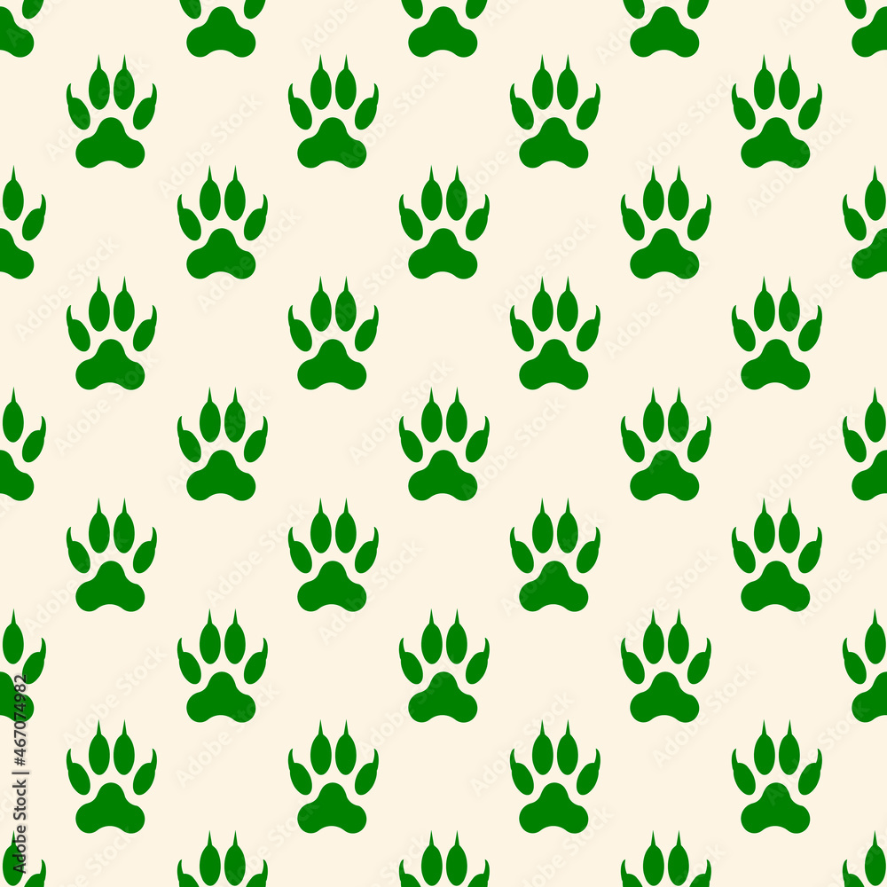seamless drawing of images of green paws. a set of green isolated ...