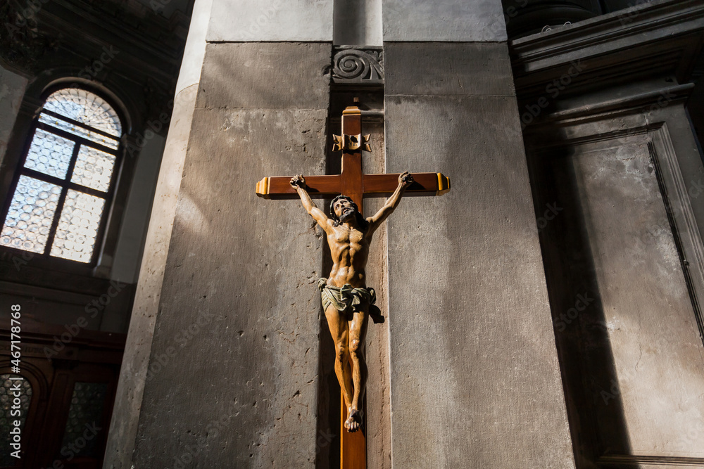 Jesus Christ on wooden cross inside famous historical cathedral Salute ...