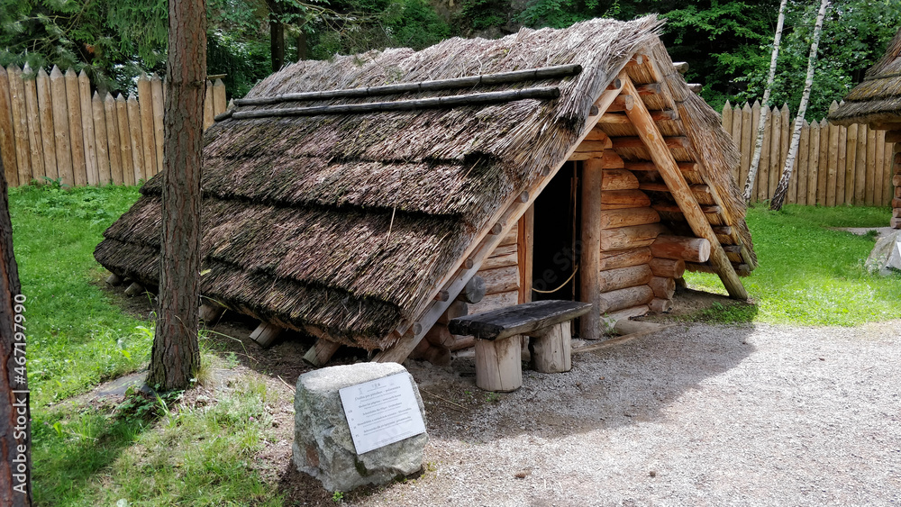 Reconstruction of prehistoric dugout of human settlement. Stock Photo ...