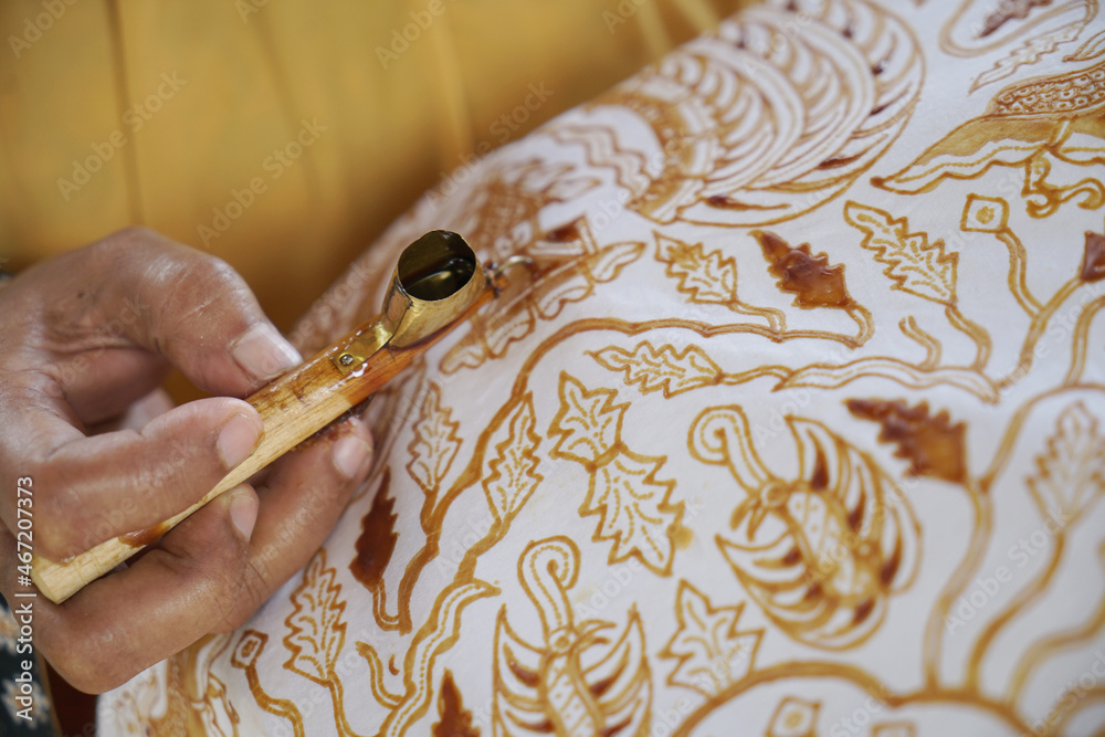 The process of making batik. Batik is a handmade traditional art from ...
