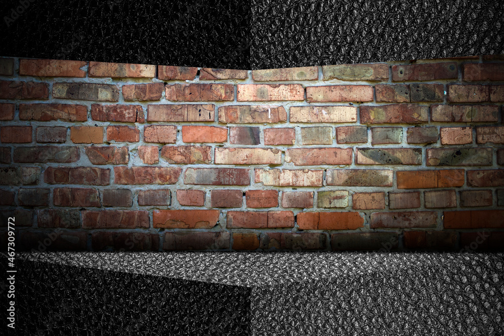 brick wall with black textured floor, background for placing the ...
