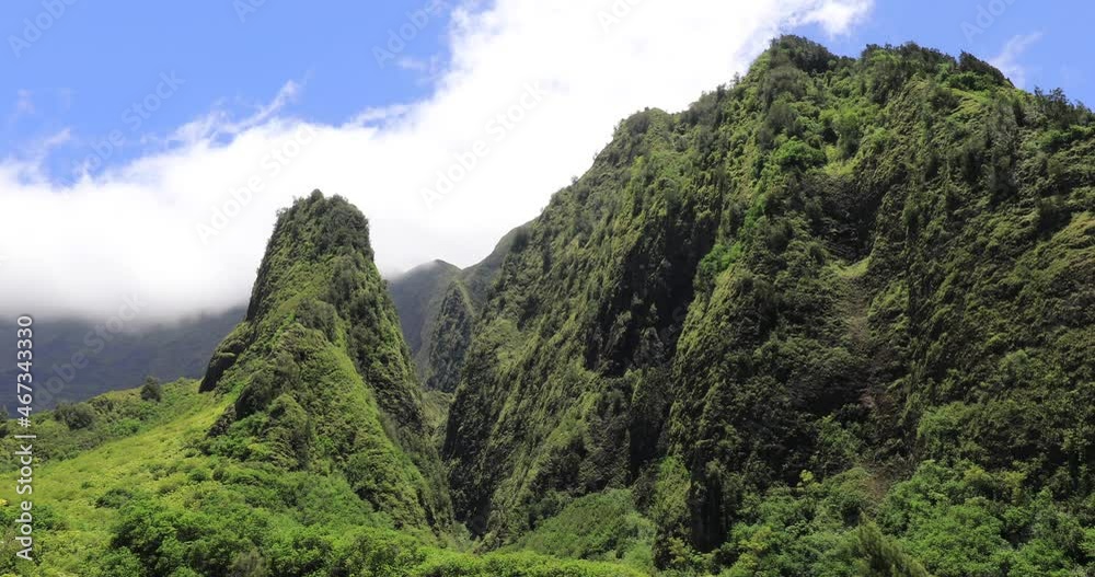 Stationary locked off shot of the Lao Needle which is a famous landmark ...