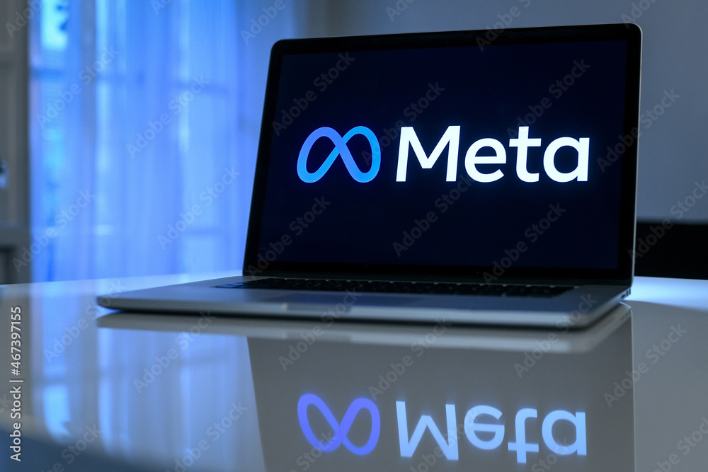 Laptop with Meta logo on display. New Mark Zuckerberg social. Computer ...