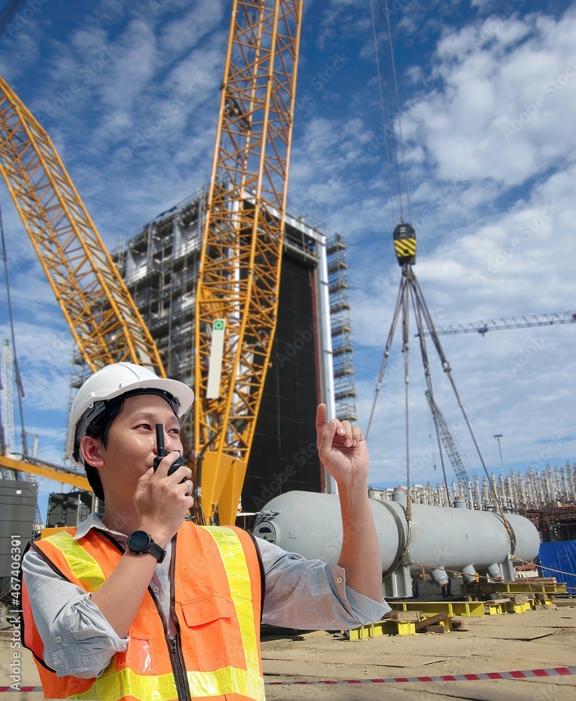 Petrochemical petroleum refinery construction heavy crane lifting ...