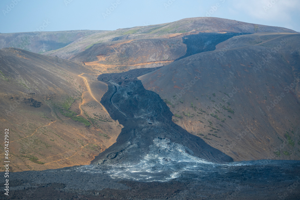 Landscape of vast molten lava rock covering valley at Fagradalsfjall ...