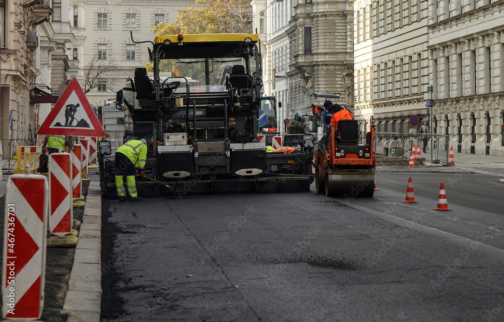 Construction site is laying new asphalt road pavement,road construction ...