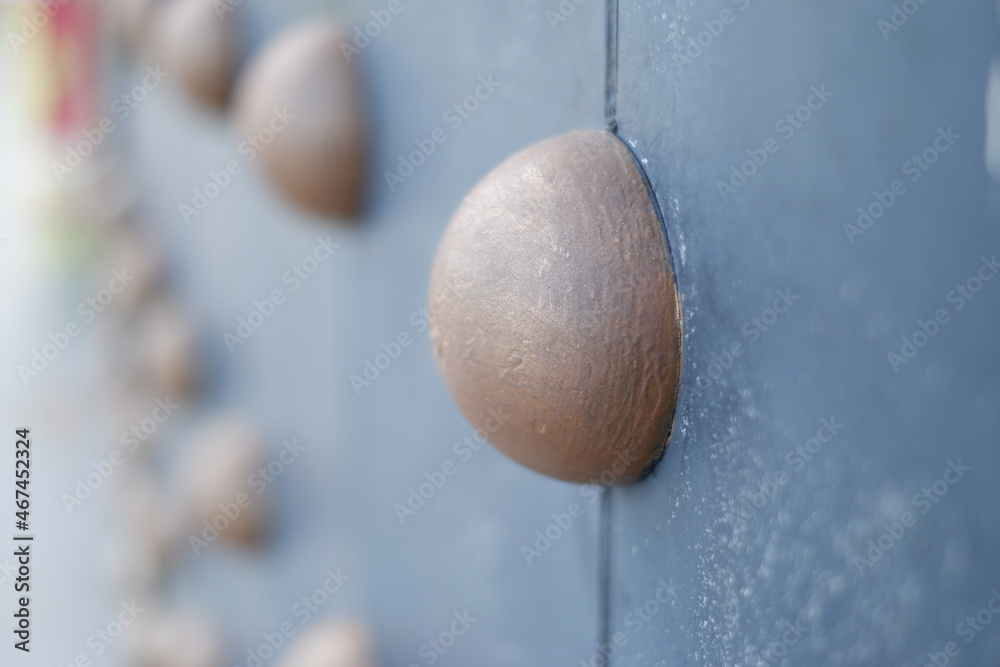 hemispherical texture embossed on a black background. this is a pattern ...