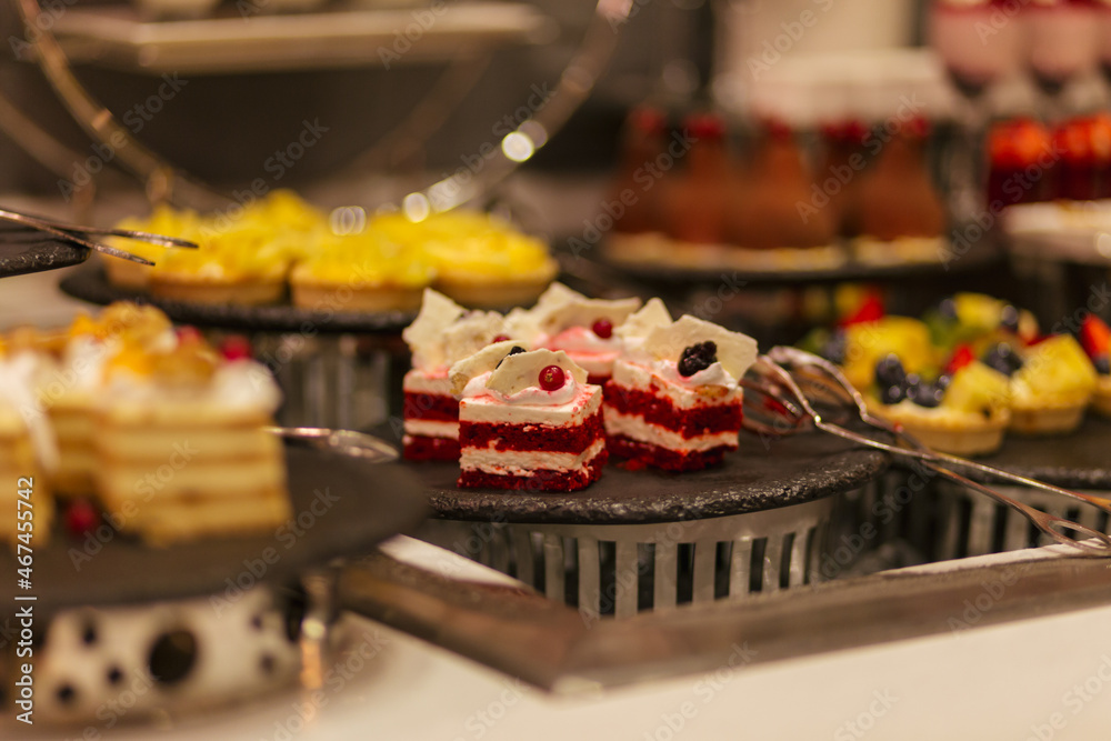 Assortment of confectionery, different types of desserts on the table ...