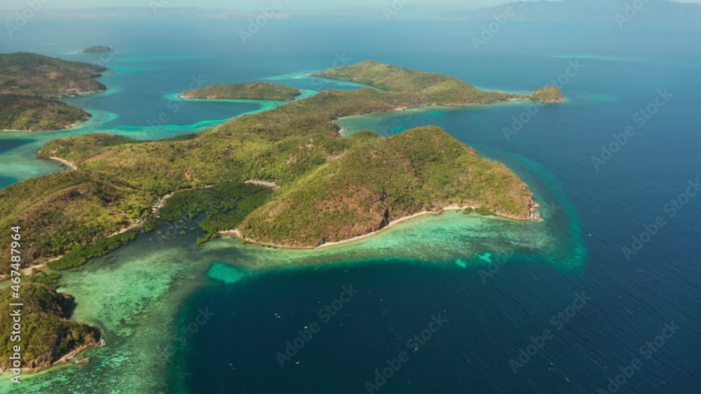 aerial view tropical islands with blue lagoon, coral reef and sandy ...