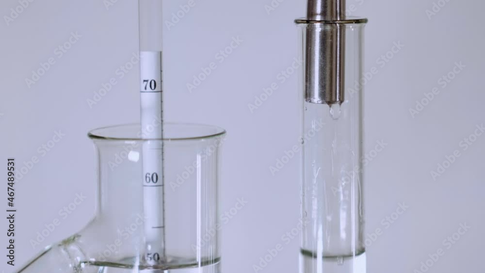 Home production of alcohol. Falling drops of alcohol fall into a ...
