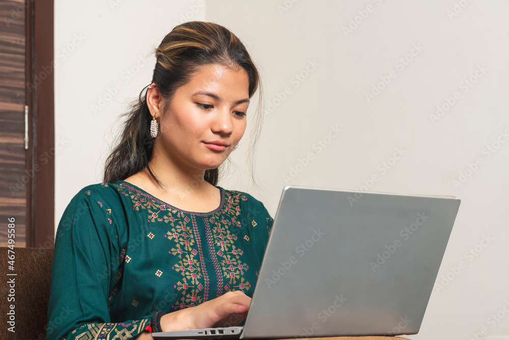 Young Indian girl smiling while looking into the camera. Indian girl ...