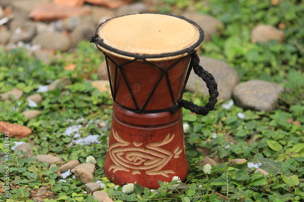 unique souvenirs of traditional percussion instruments called Kendang ...