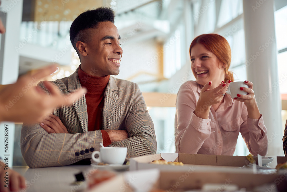 man laughing at funny joke with diverse coworkers.friendly work team ...