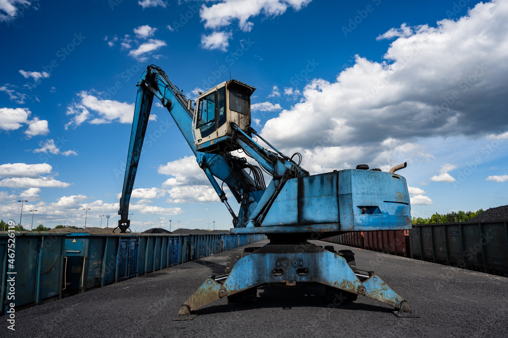 Loading of coal and coke into wagons at the reloading terminal with the ...