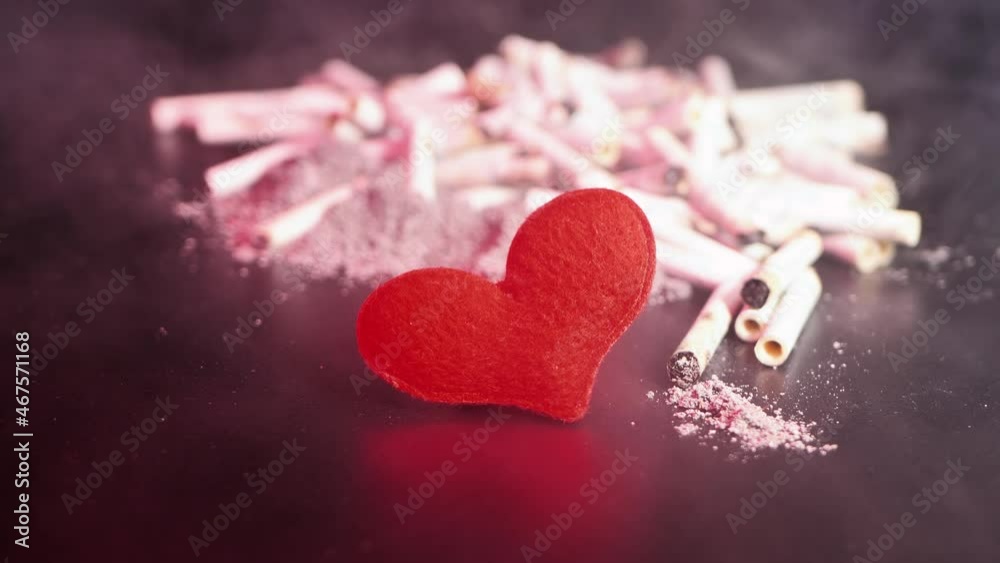 Stack of cigarette cigarettes with red heart, tip stems, cigarette ...