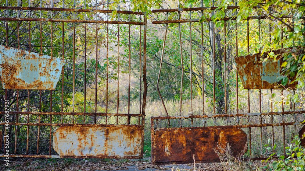 old rusty iron gate with a deadbolt. old rusty iron. rusty grungy old ...