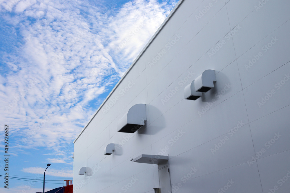 Air conditioning and ventilation ducts installed next to the building ...