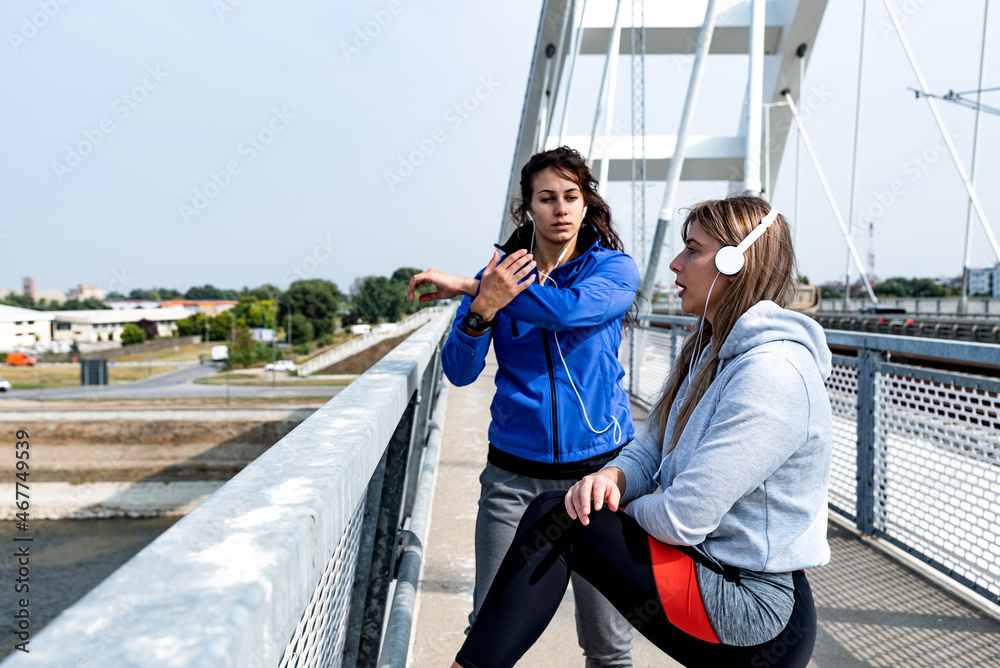 Two young happy and self loved jog women business partners taking a ...
