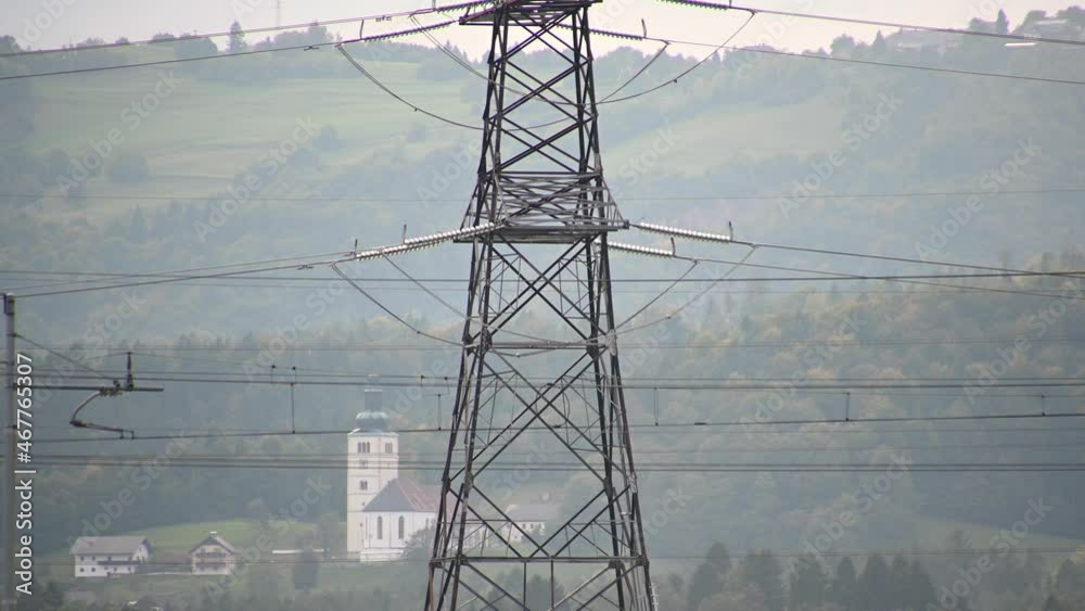 Close up view of high voltage electric tower. Transmission power line ...