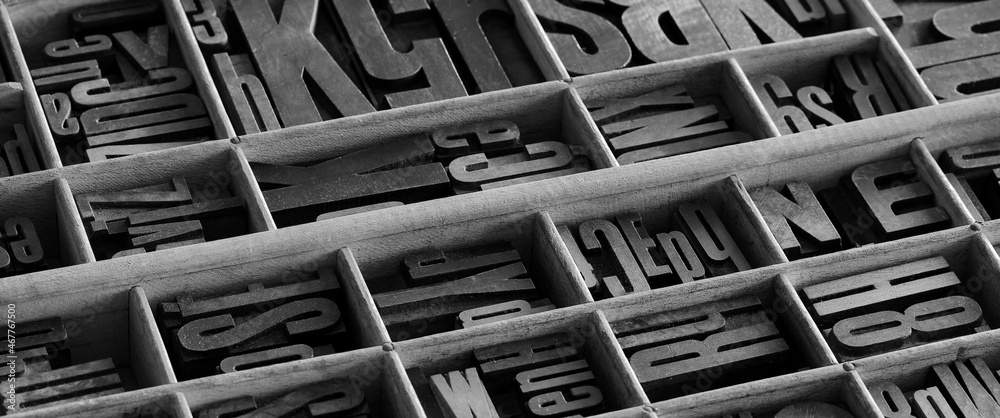 Old letterpess background. Collection of vintage block letters made of ...