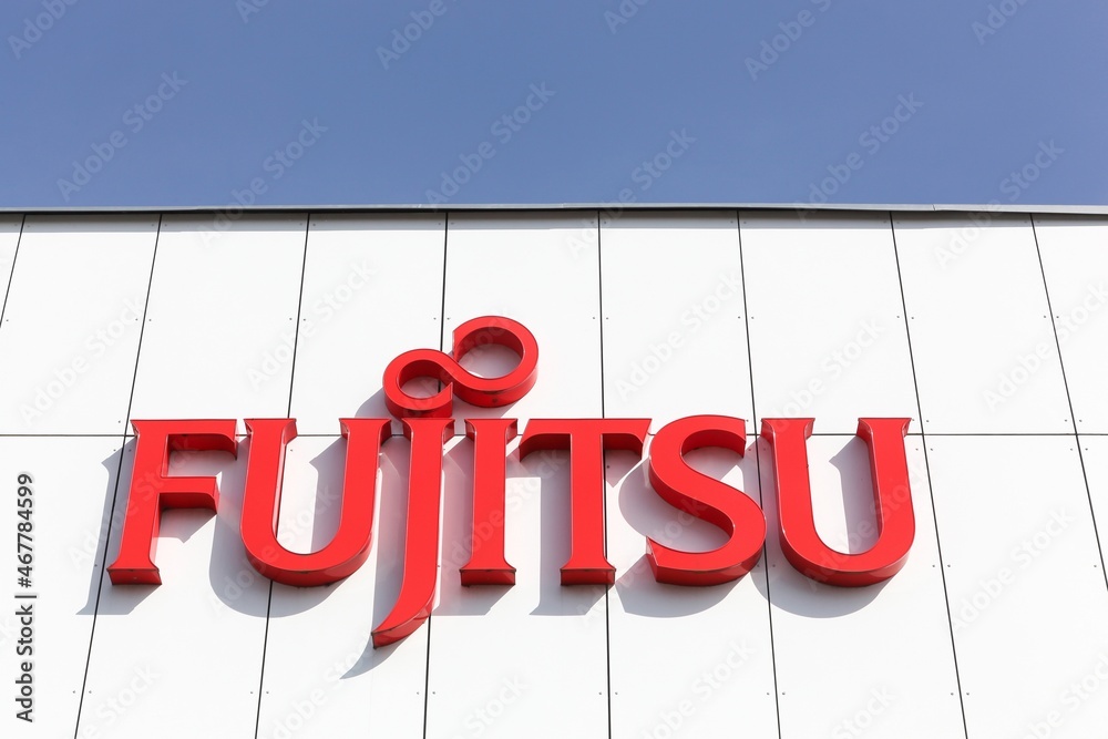 Holme, Denmark - April 8, 2018: Fujitsu logo on a wall. Fujitsu is a ...