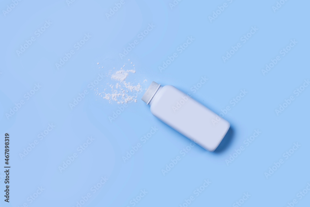 Baby powder on blue background. Top view. Baby talcum powder container ...