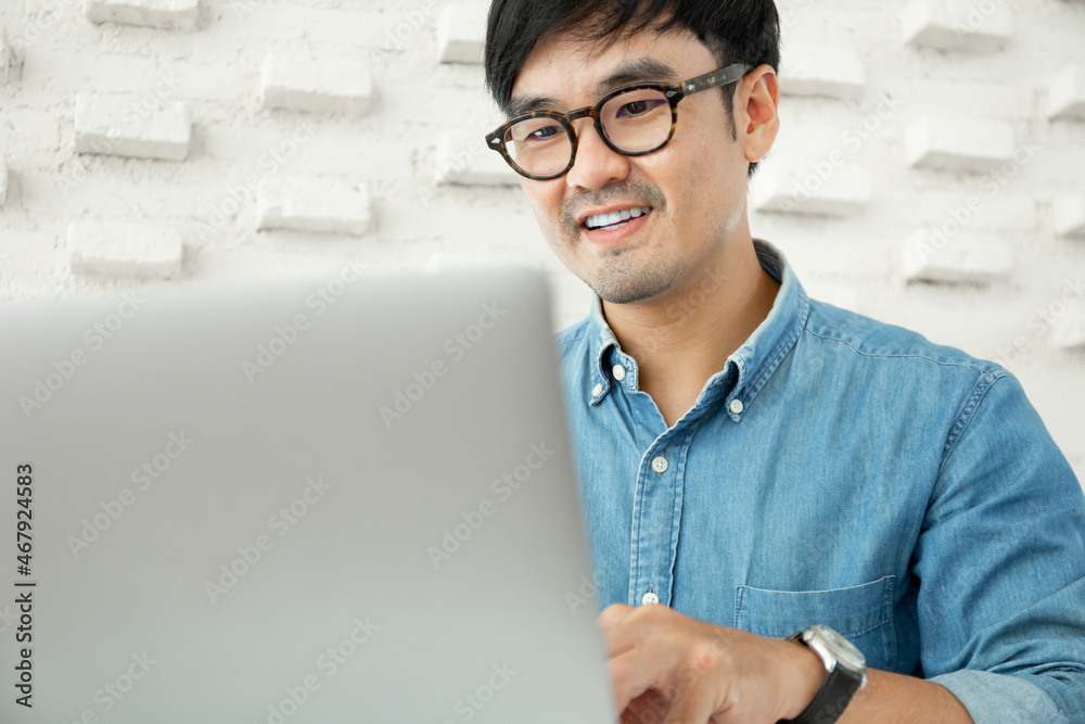 asian man work using computer hand typing laptop keyboard contact us ...