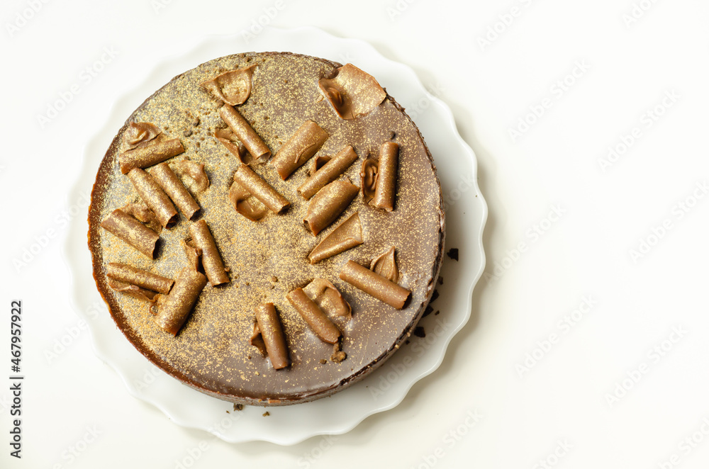 Digestive biscuit base with chocolate cheesecake and pockets of salted ...