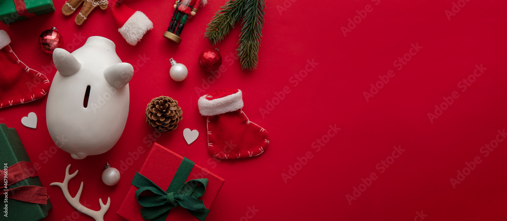 Festive Christmas financial savings concept. White piggy bank money box ...