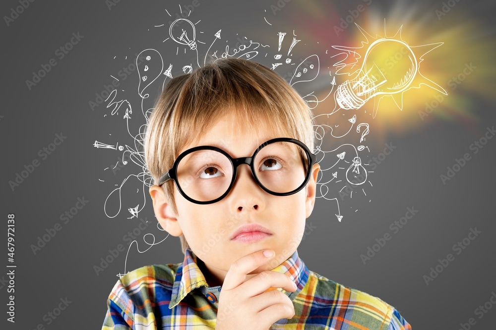 Thinking child boy with light bulb and question marks. Brainstorming ...