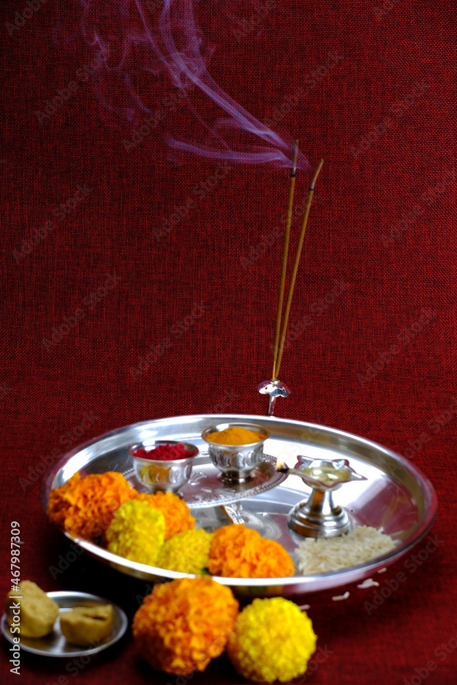 Pooja Thali for festival celebration to worship, rice grain and kumkum ...