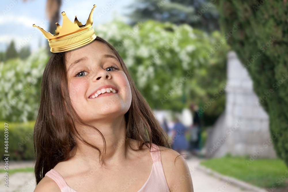 Princess concept. Girl wears a golden crown symbol of a princess. Stock ...