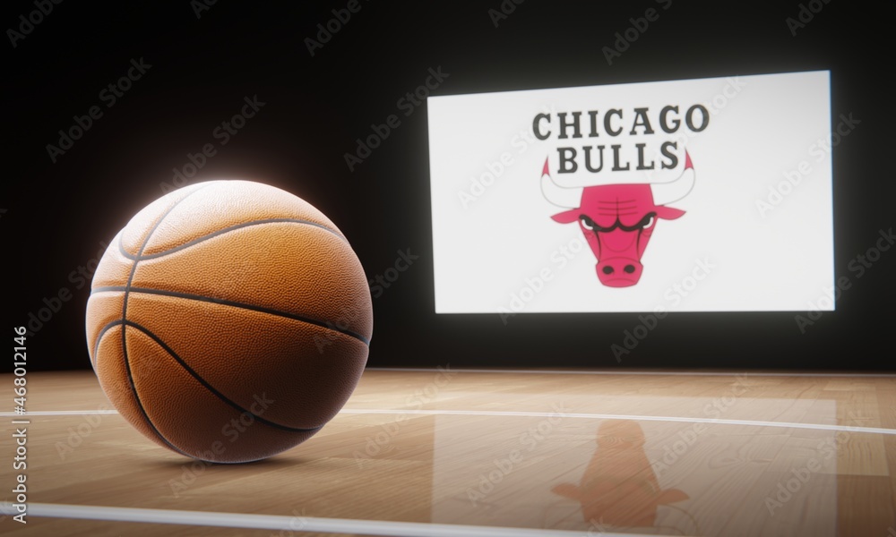 Basketball in foreground with logo of NBA team Chicago Bulls projected ...