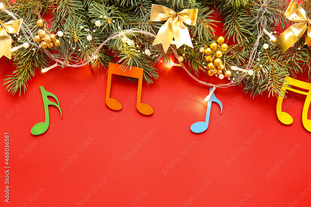 Note signs with Christmas decor and fir branches on red background ...