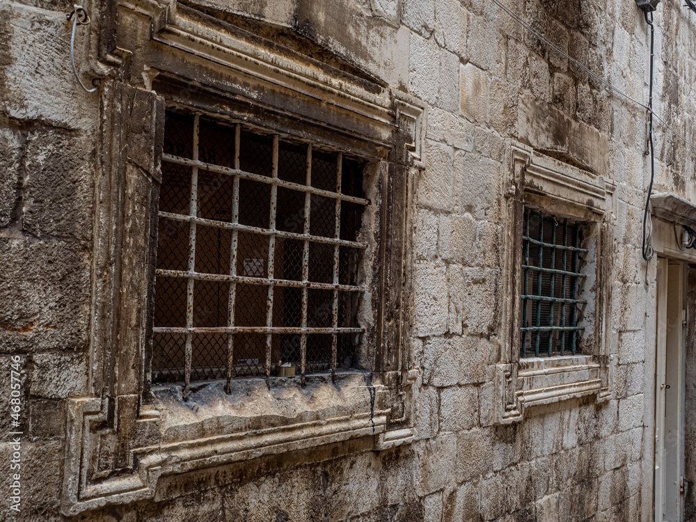 Ironclad window covering set into fortified stone wall around Dubrovnik ...