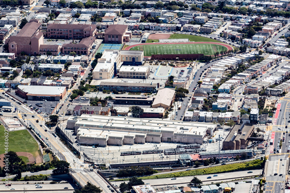 Aerial View of a Local High School and an Athletic Field in a ...