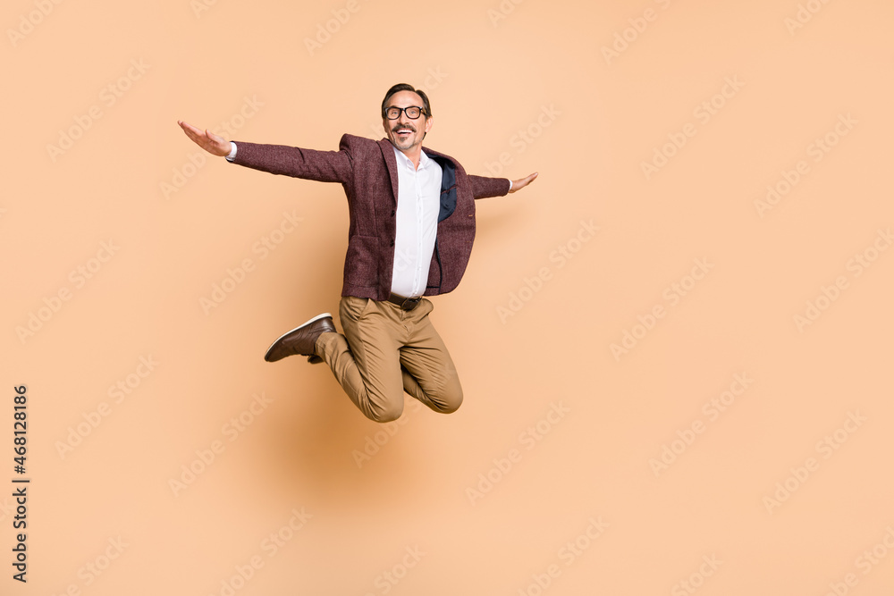 Full length body size view of attractive cheery carefree man jumping ...