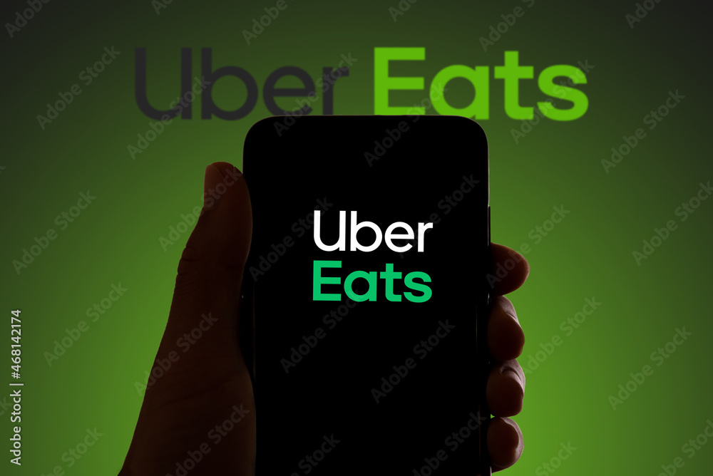 In this photo illustration the logo of the food delivery service Uber ...