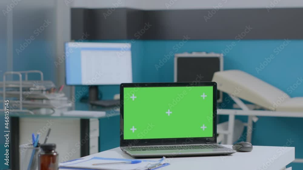 Empty hospital office with nobody in it with medical paperwork on table ...