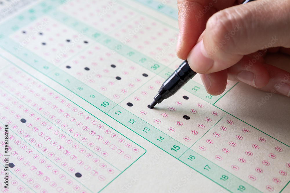 Korea, Seoul - November 2021: Test taker are filling out OMR cards for ...