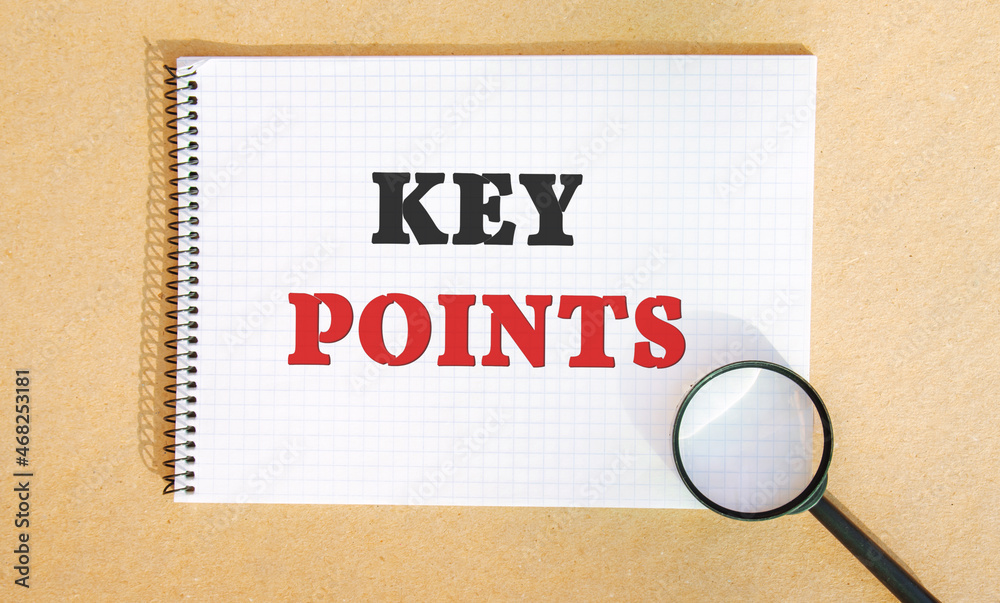 Notebook with words Key points and a magnifying glass. Business management concept, strategy ...