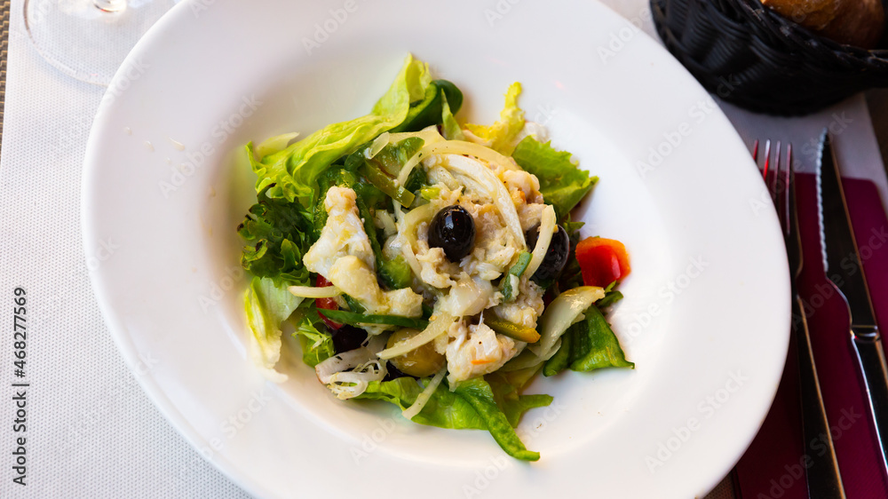 Esqueixada cod, salad of shredded salt cod with vegetables, typical ...